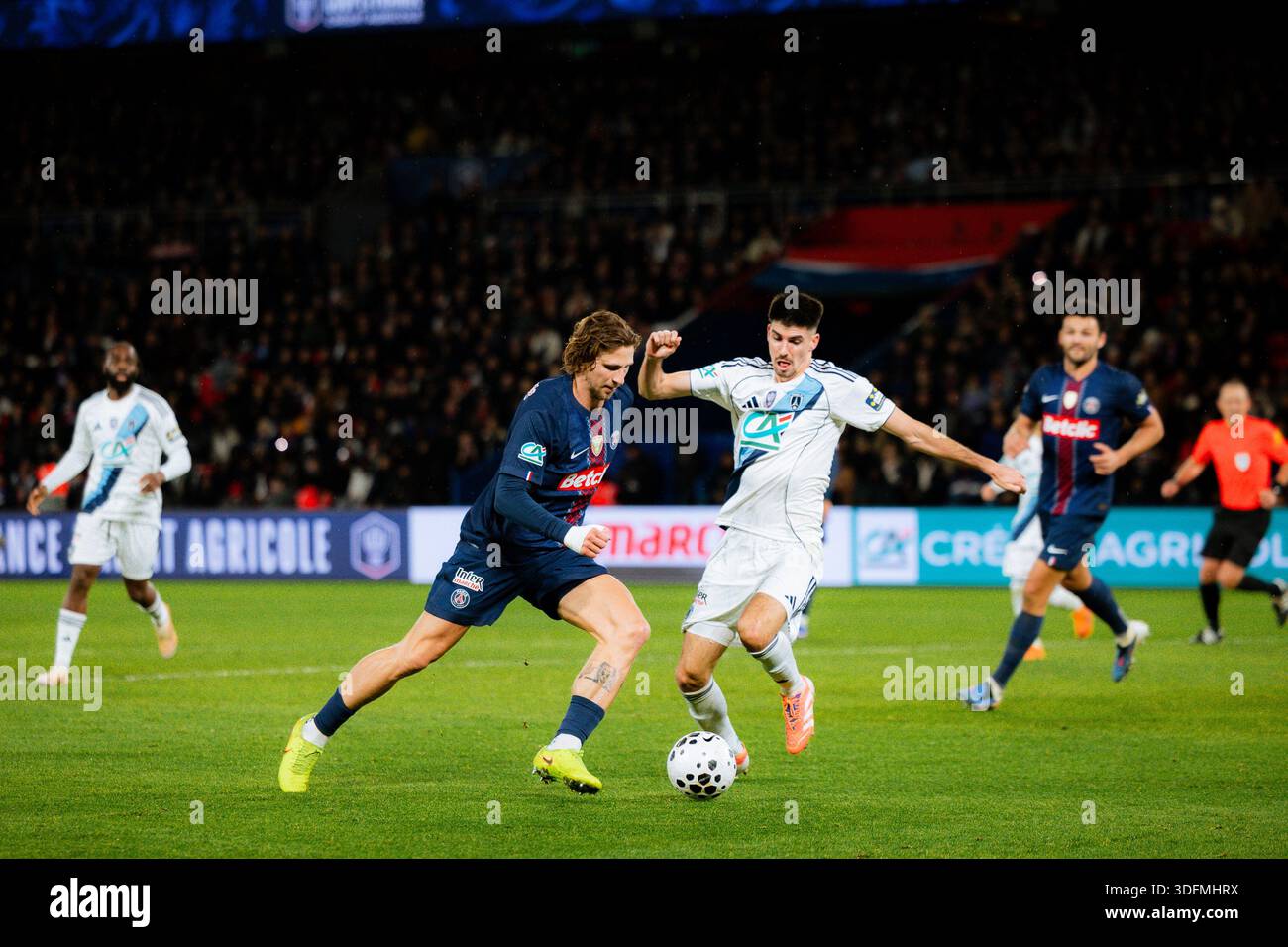 Thibault De Smet of Paris FC and Illia Zabarnyi of Paris Saint-Germain ...