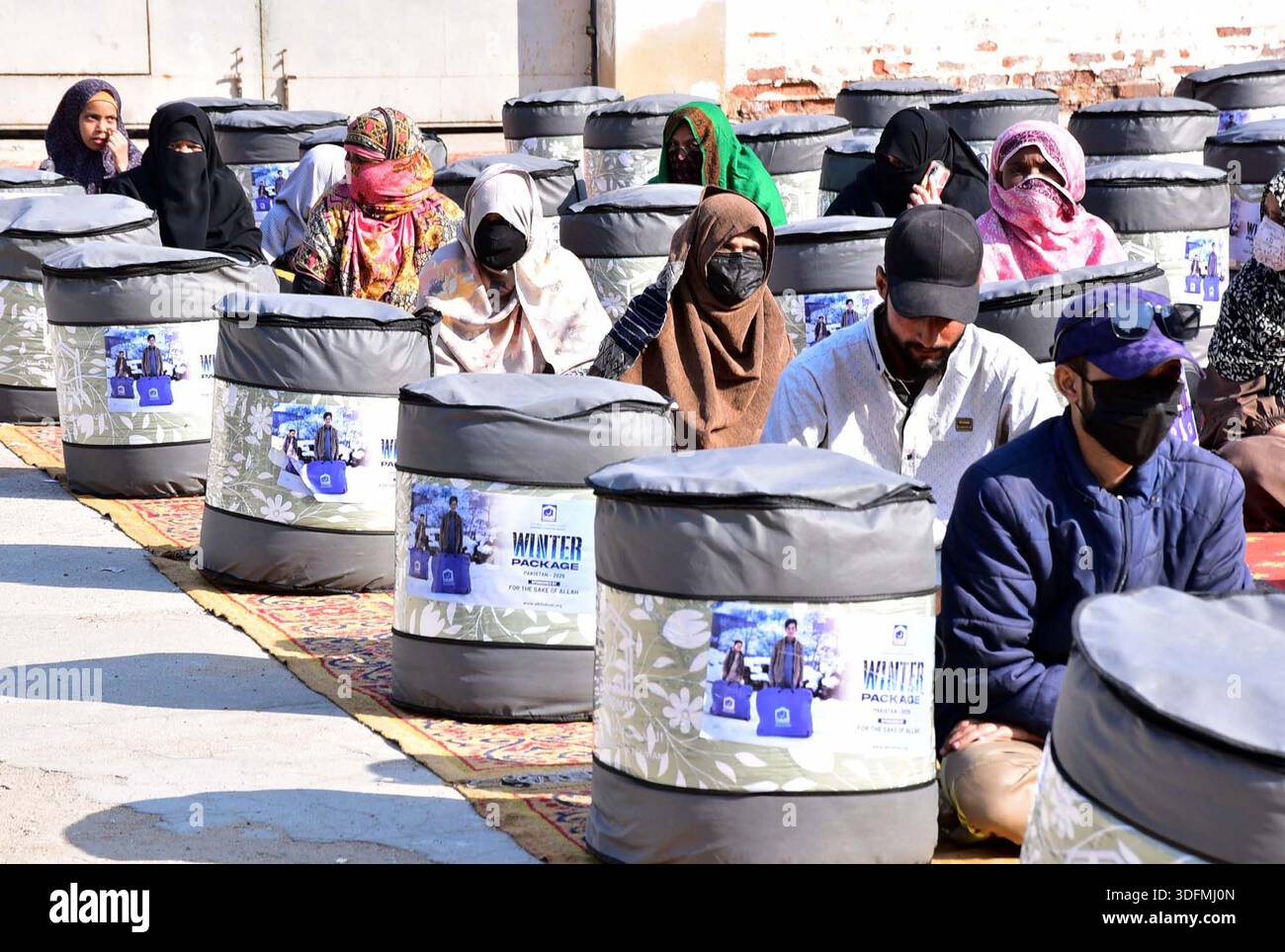 HYDERABAD, PAKISTAN, JAN 13: Winter packages are being distributed ...