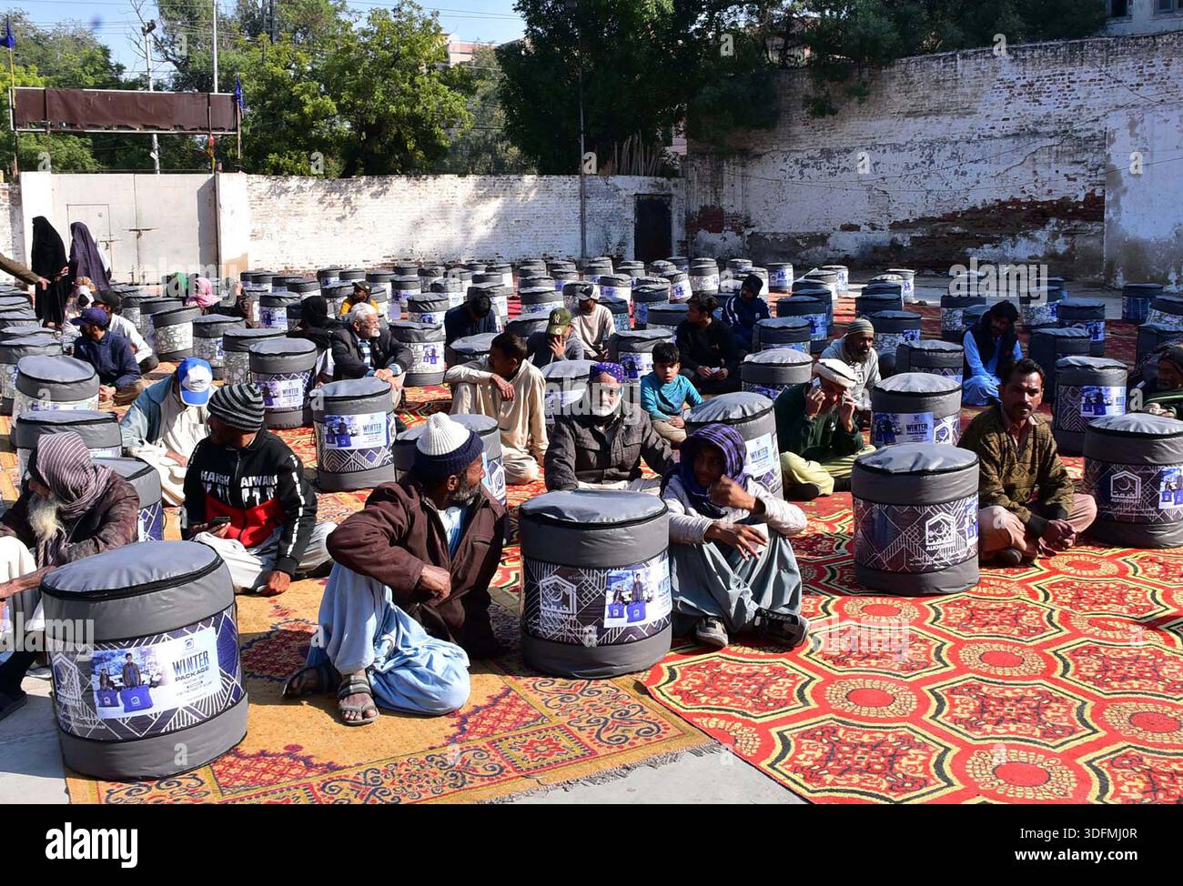 HYDERABAD, PAKISTAN, JAN 13: Winter packages are being distributed ...