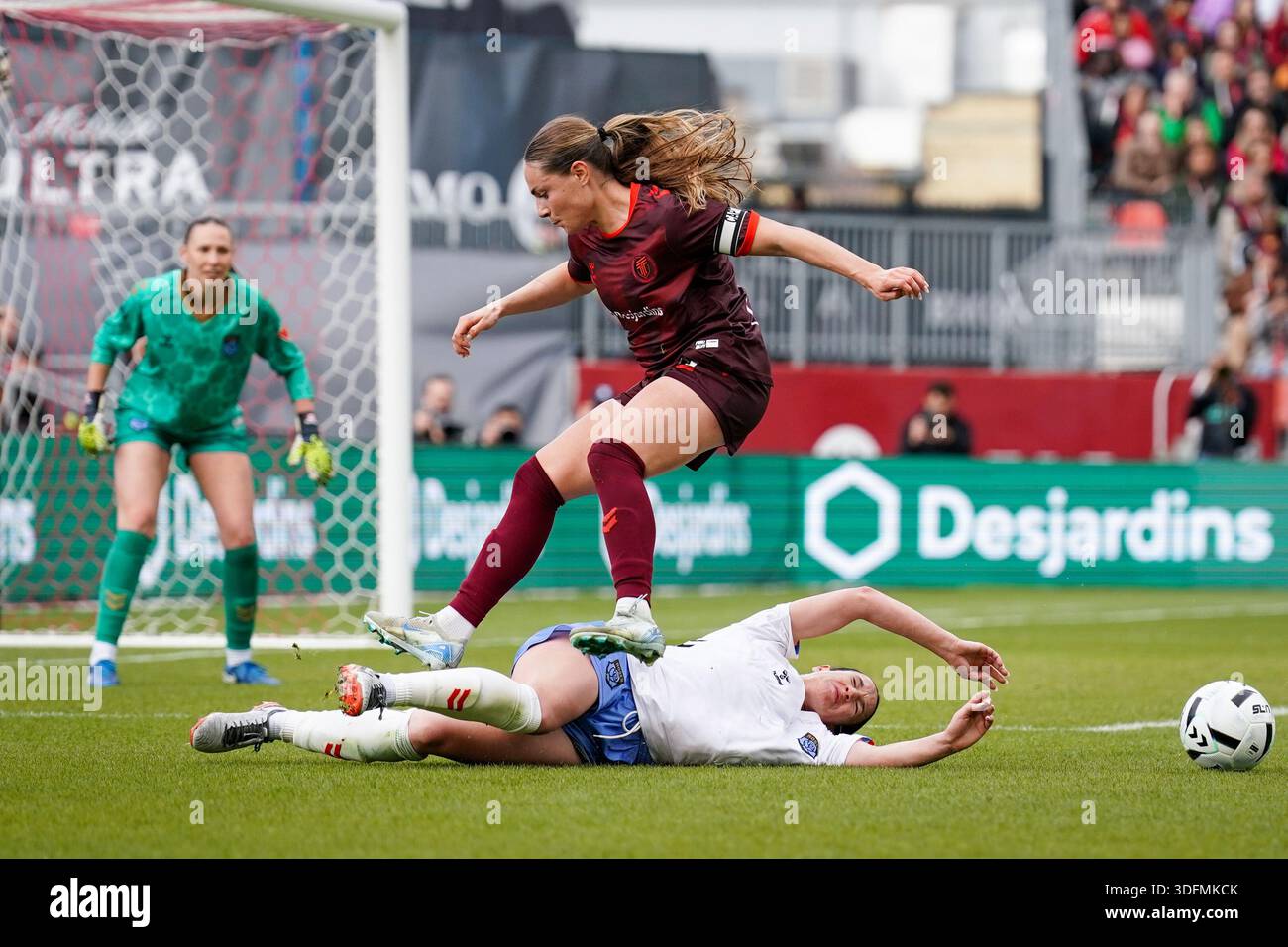 AFC Toronto defender Emma Regan (8) jumps over Montreal Roses FC ...