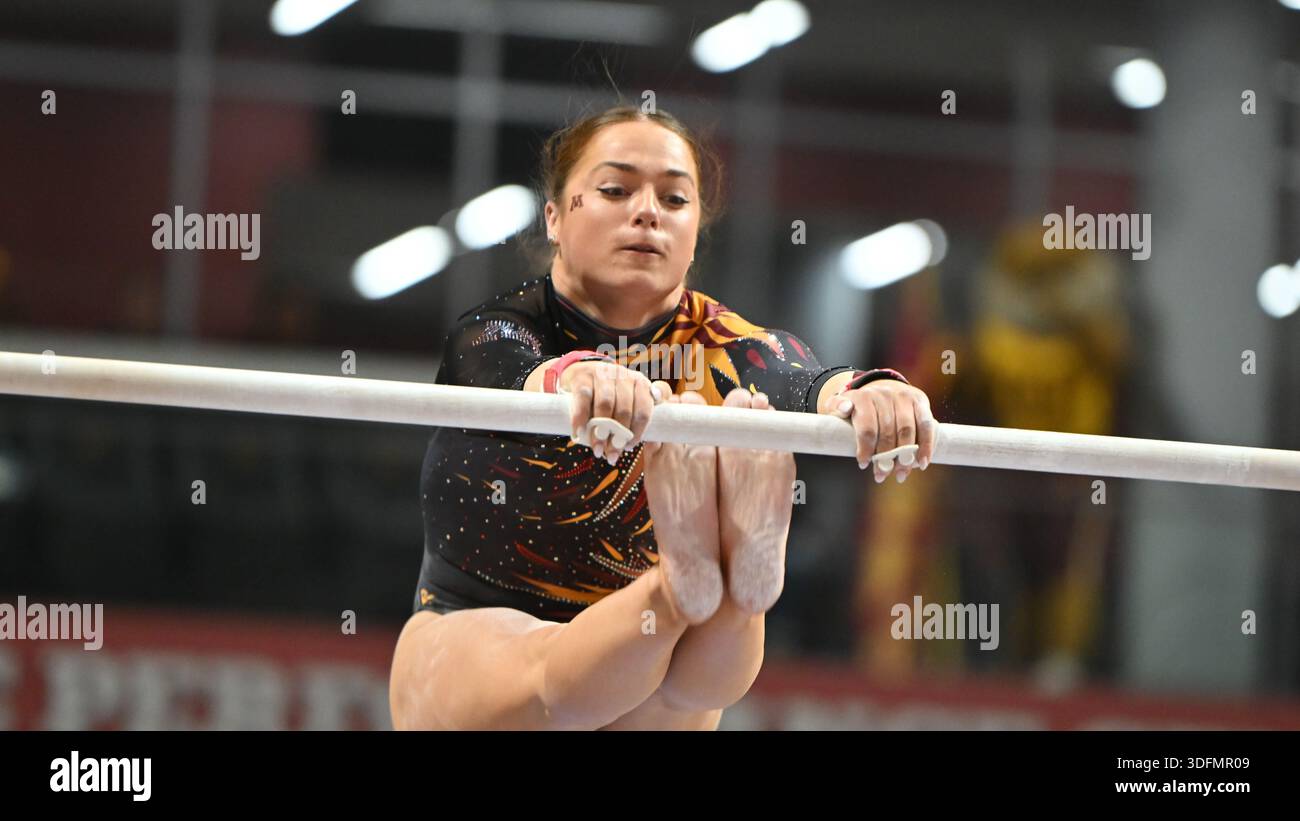 Minnesota's Emma Slevin competes on the uneven parallel bars against ...