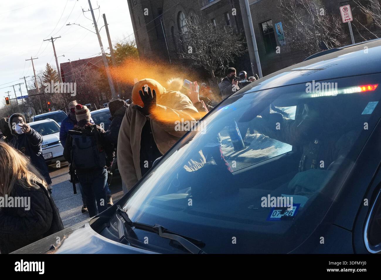 A protester is sprayed with pepper spray by a Federal agent Tuesday ...
