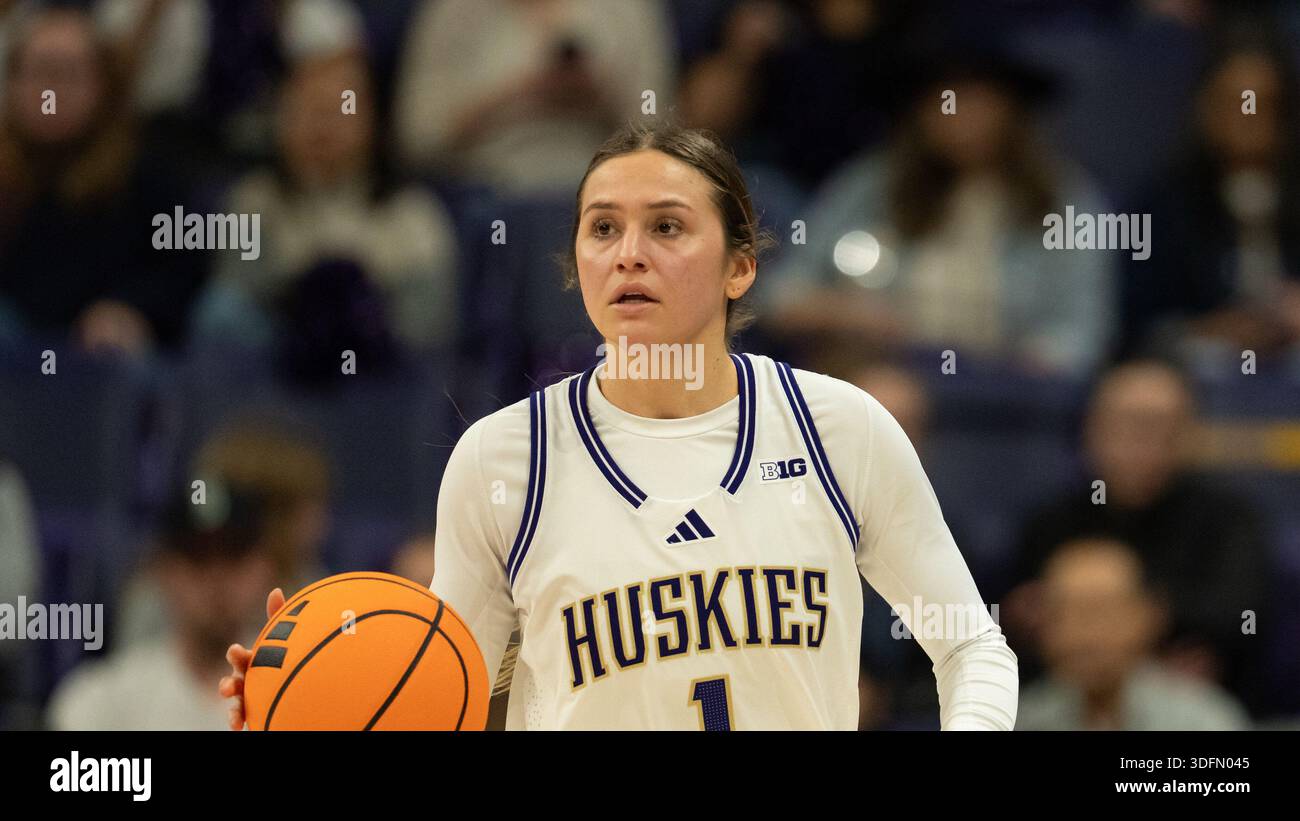 Washington guard Hannah Stines dribbles the ball during an NCAA ...