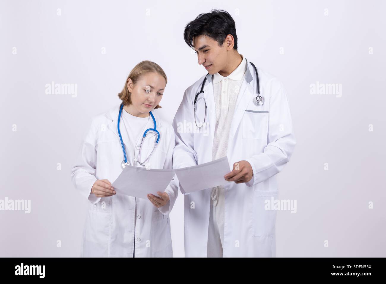 Reviewing charts medical team hi-res stock photography and images - Alamy