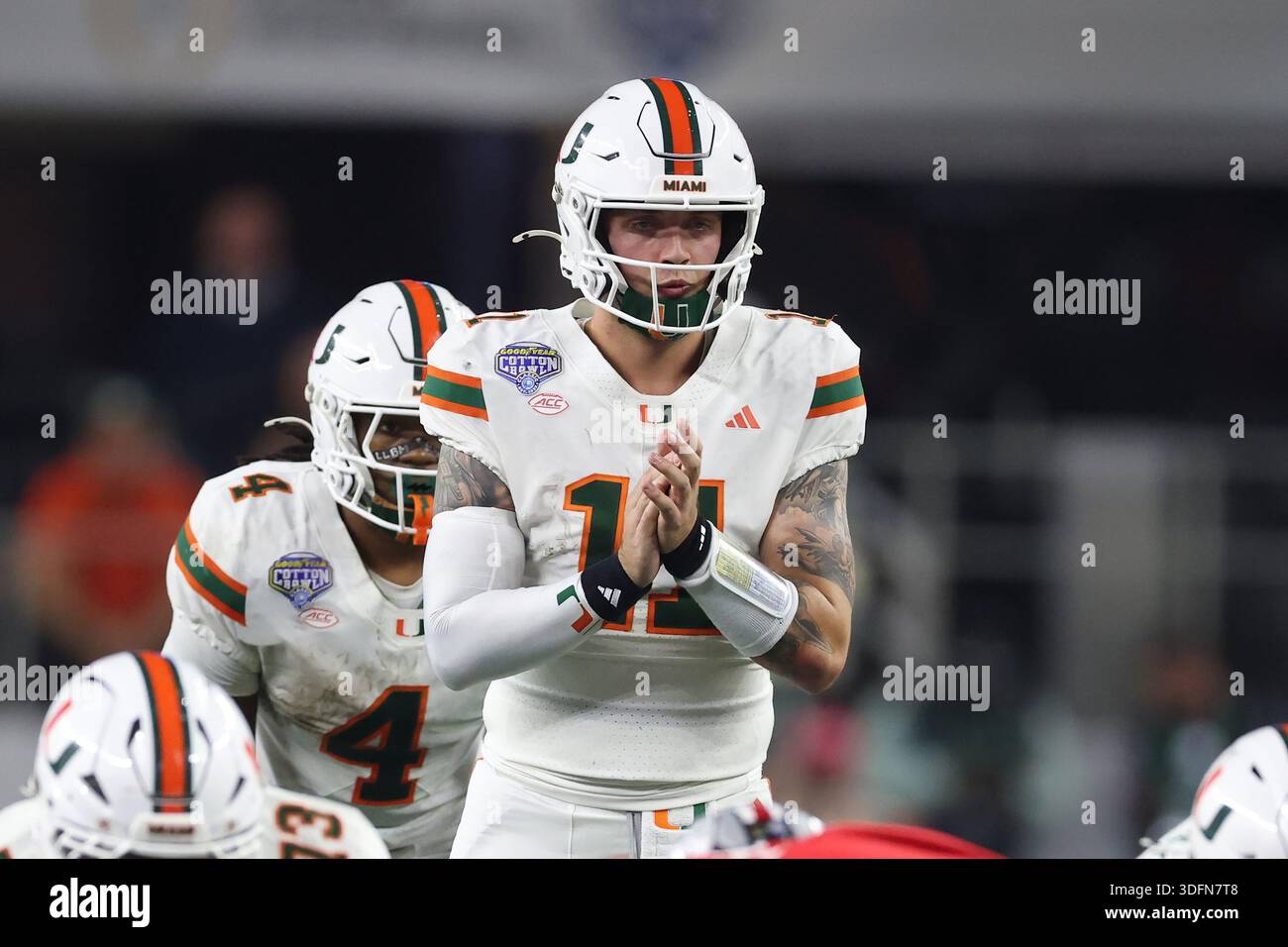 Miami quarterback Carson Beck (11) calls a play before the snap during ...