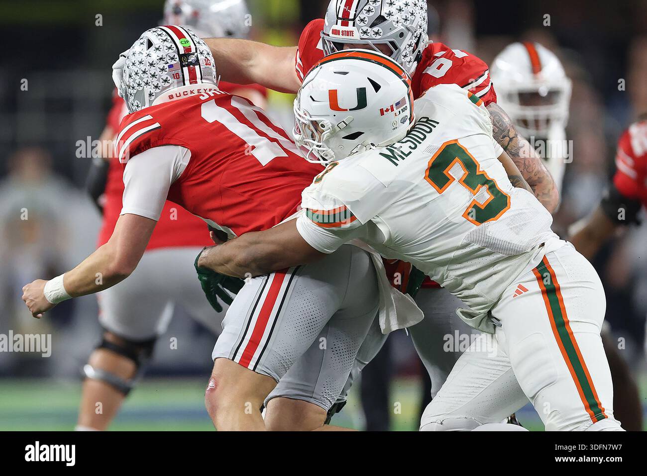Miami defensive end Akheem Mesidor (3) sacks Ohio State quarterback ...