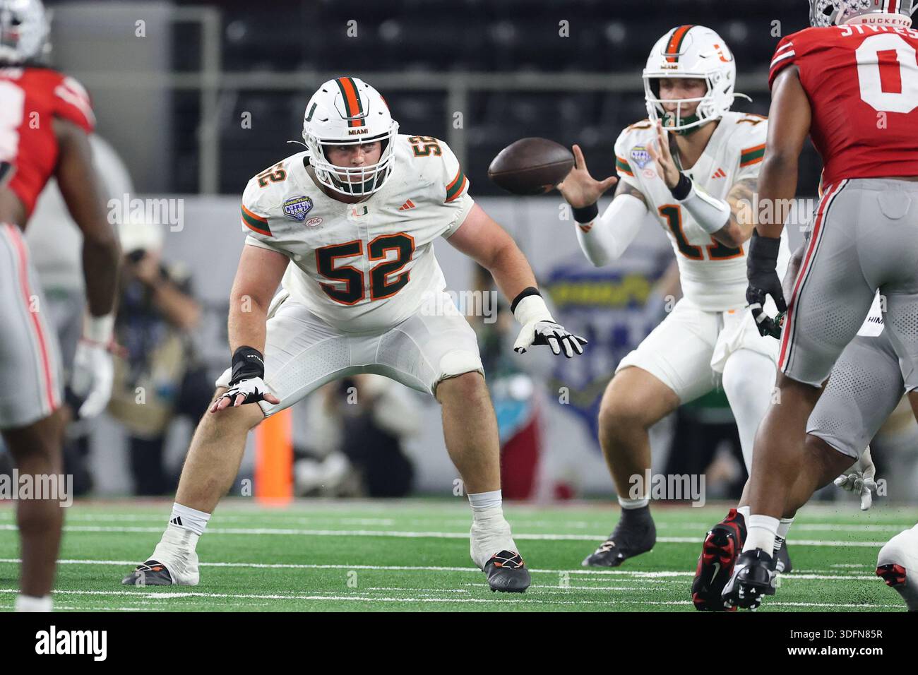Miami center James Brockermeyer (52) snaps the football to quarterback ...