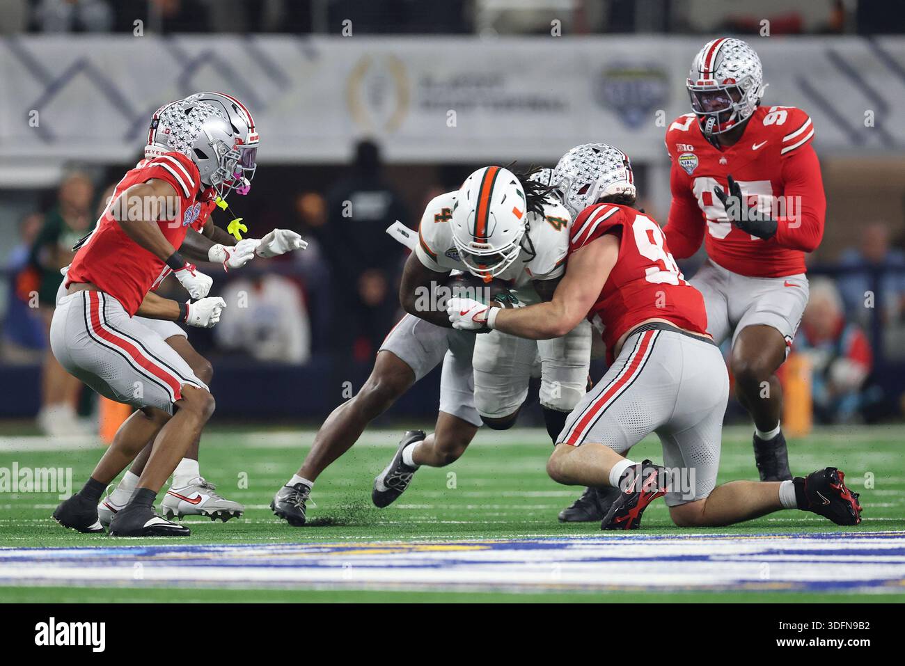 Ohio State defensive end Caden Curry (92) tackles Miami running back ...