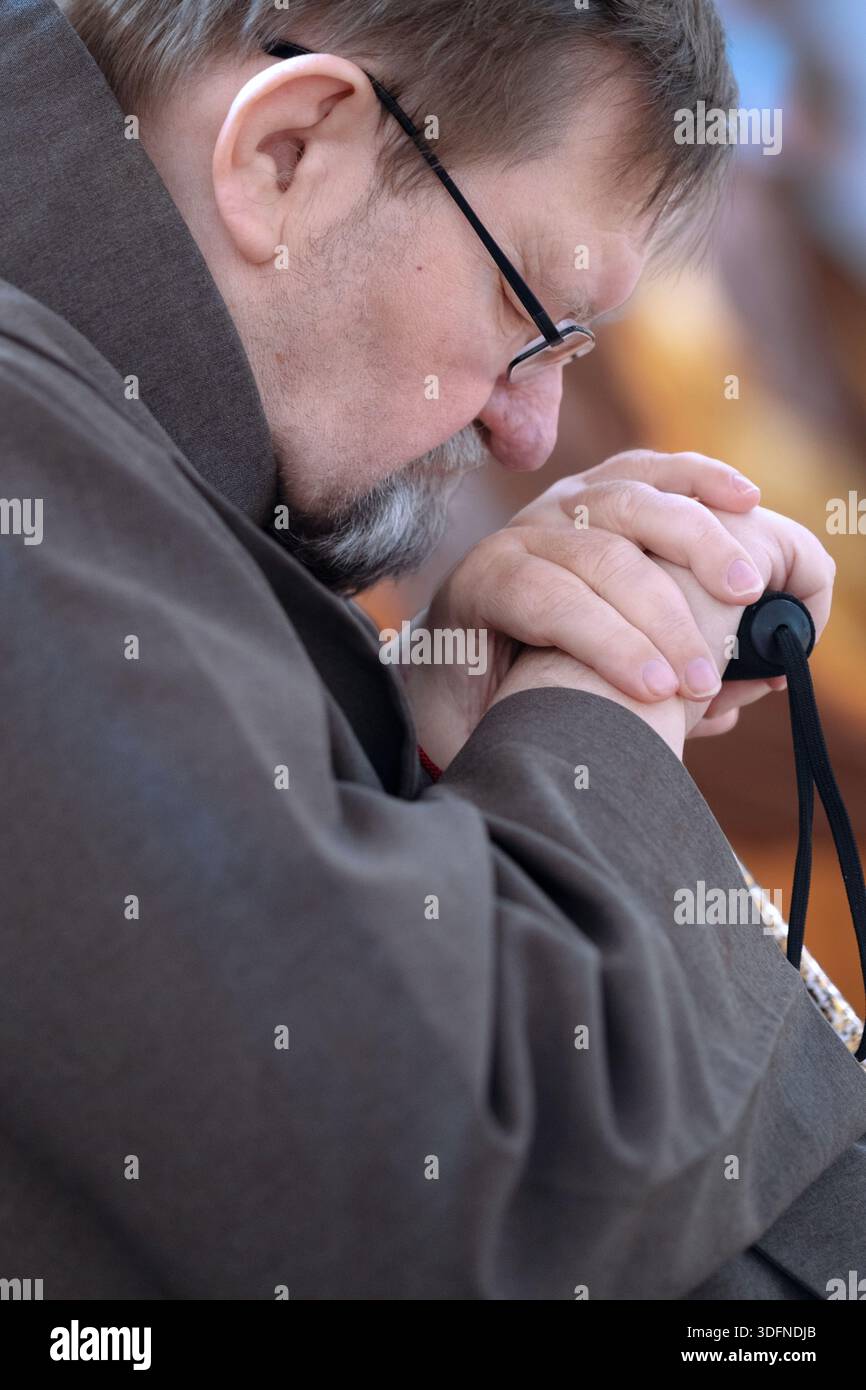 Franciscan friar praying in hi-res stock photography and images - Alamy