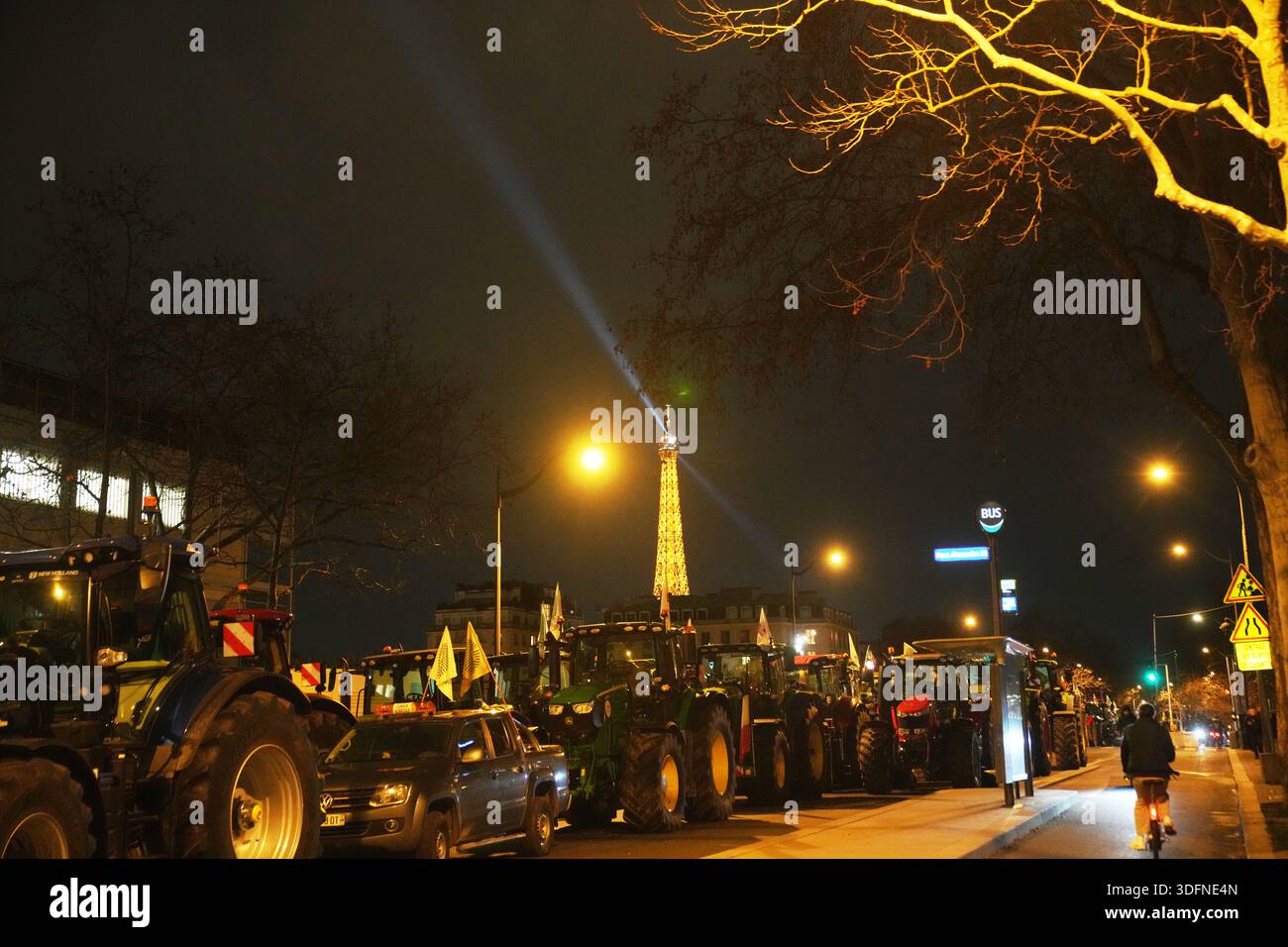 Farmers park their tractors near the French Assembly as they protest ...