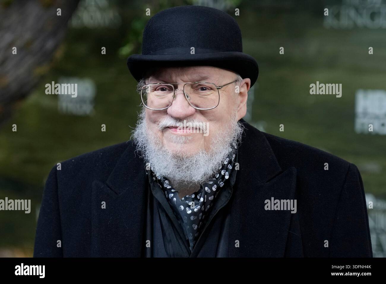 George R. R. Martin poses for photographers upon arrival at the World ...