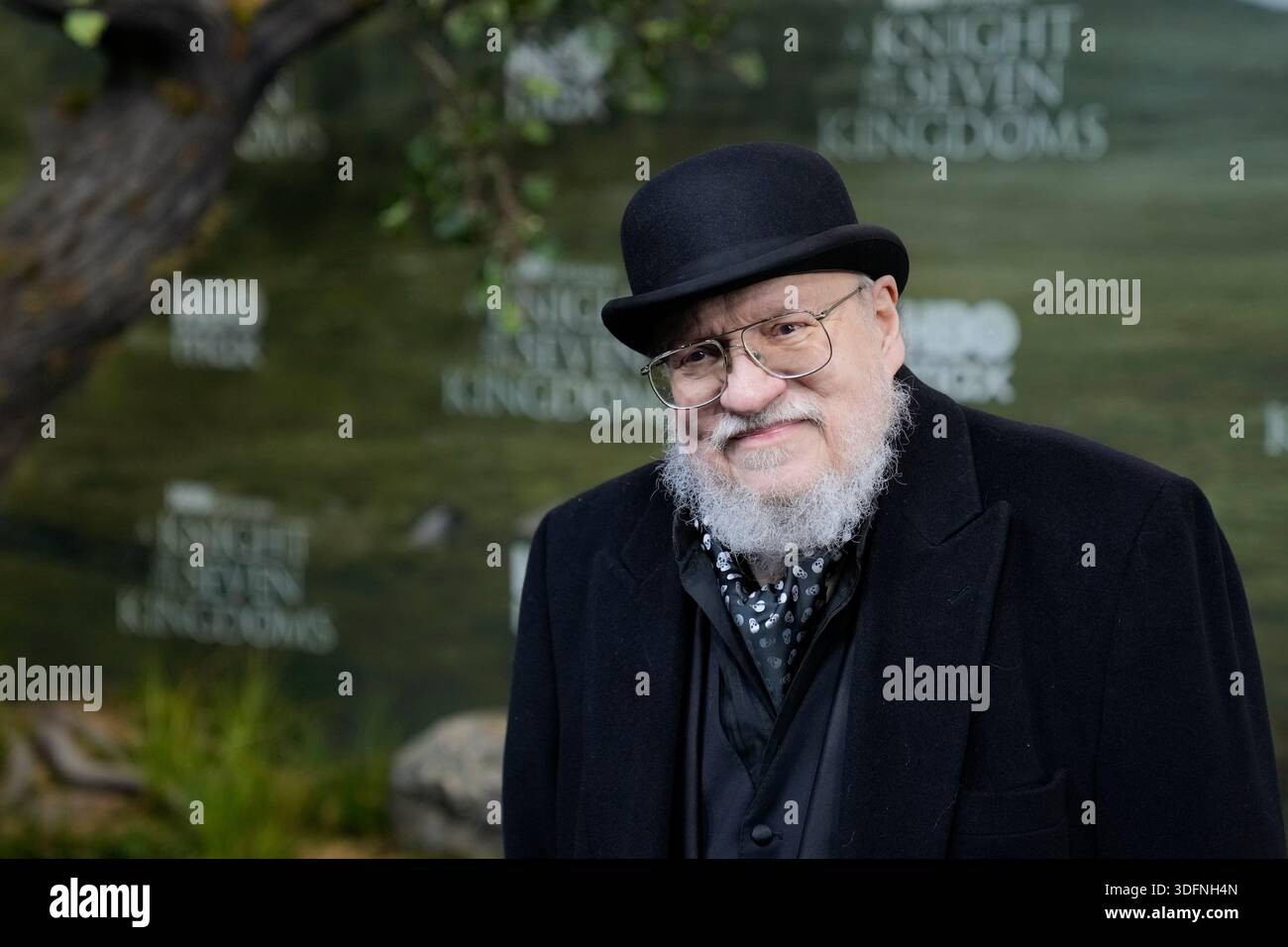 George R. R. Martin poses for photographers upon arrival at the World ...