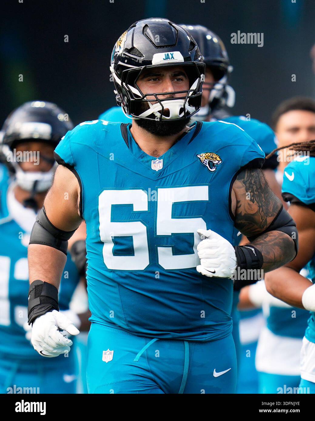 Jacksonville Jaguars guard Patrick Mekari (65) enters the field before ...