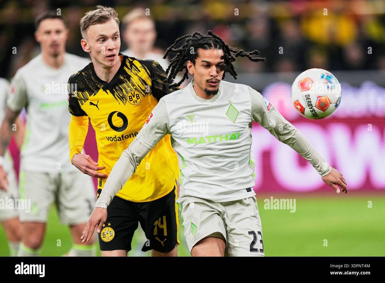 Dortmund's Maximilian Beier vies fro the ball with Bremen's Isaac ...