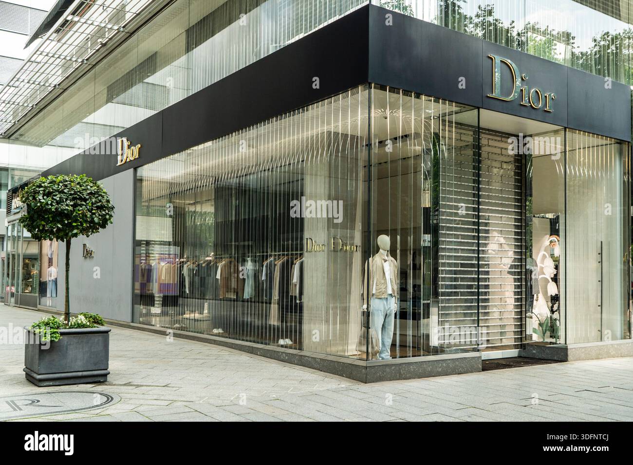 Luxury storefront of the Dior fashion boutique with modern glass ...