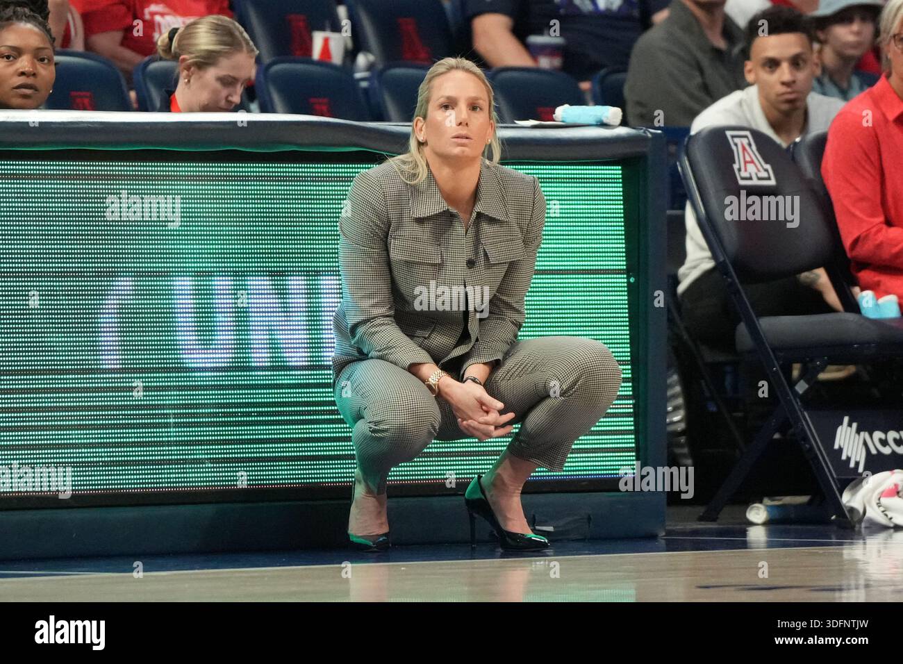 Arizona head coach Becky Burke during an NCAA basketball game against ...