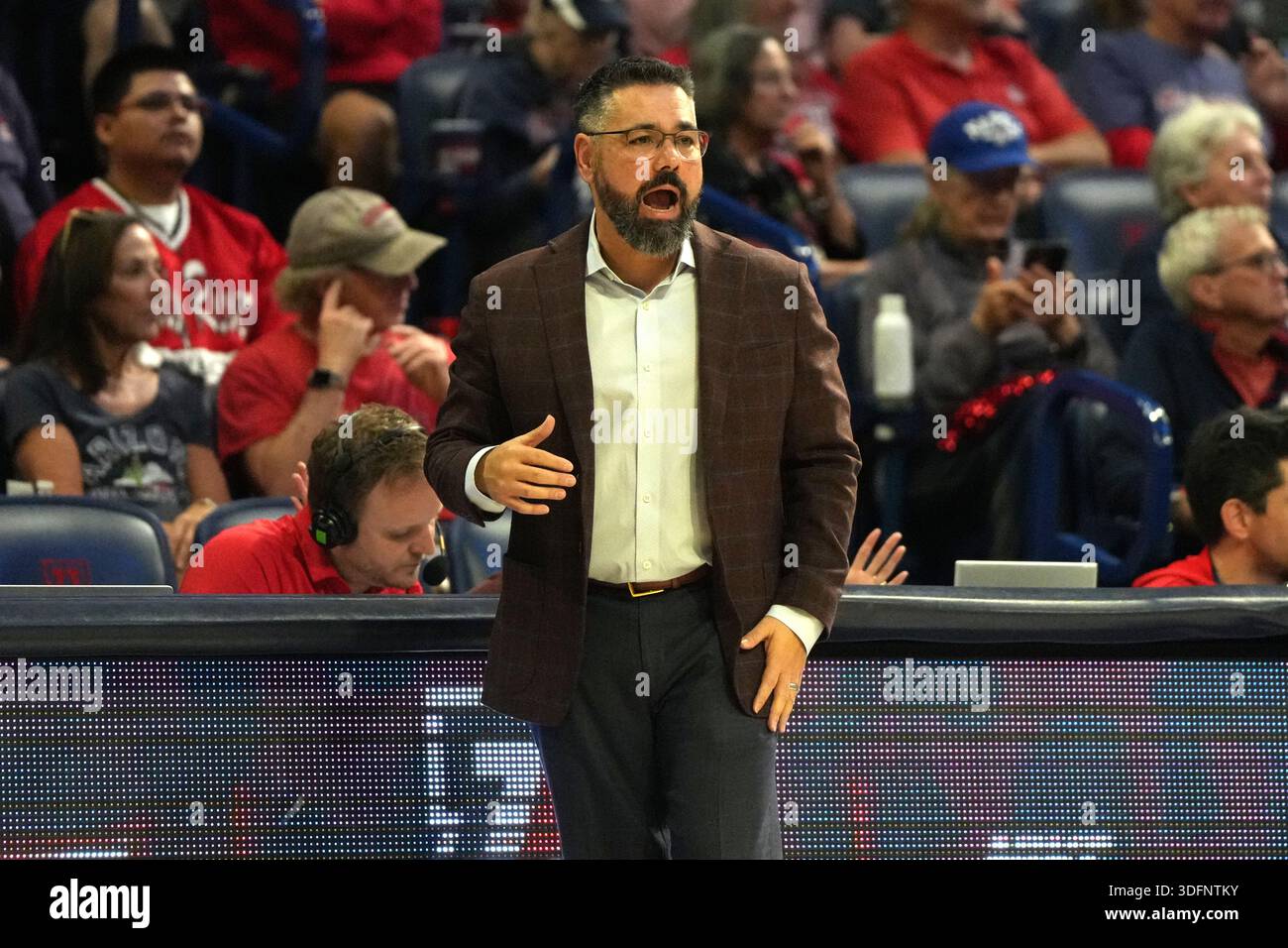 Utah head coach Gavin Petersen during an NCAA basketball game against ...