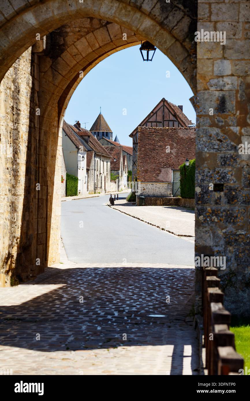 Stone medieval gateway opens to a charming town Provins, France Stock ...