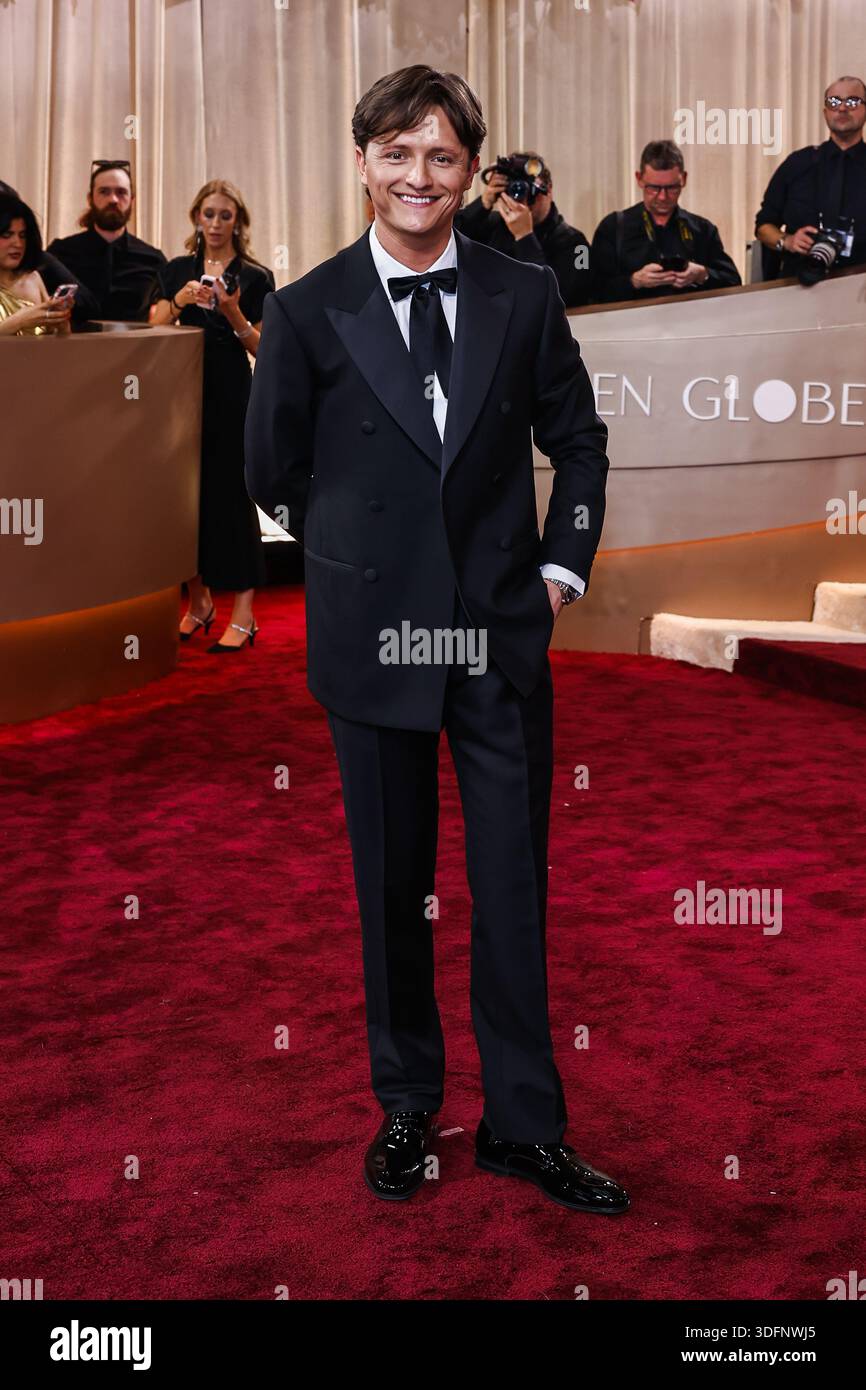 Connor Wood walking on the red carpet at The 83rd Annual Golden Globe ...