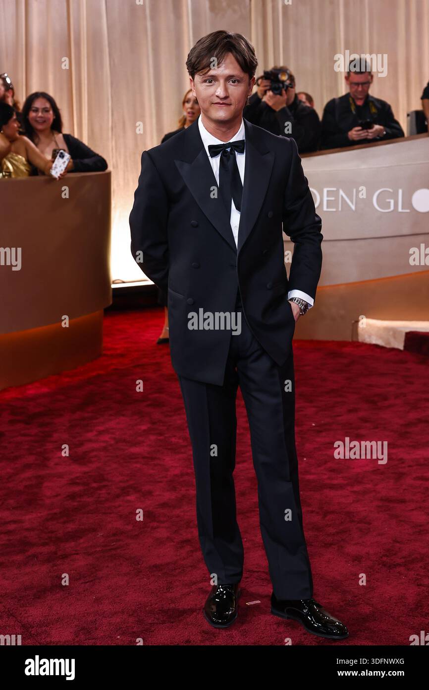 Connor Wood walking on the red carpet at The 83rd Annual Golden Globe ...