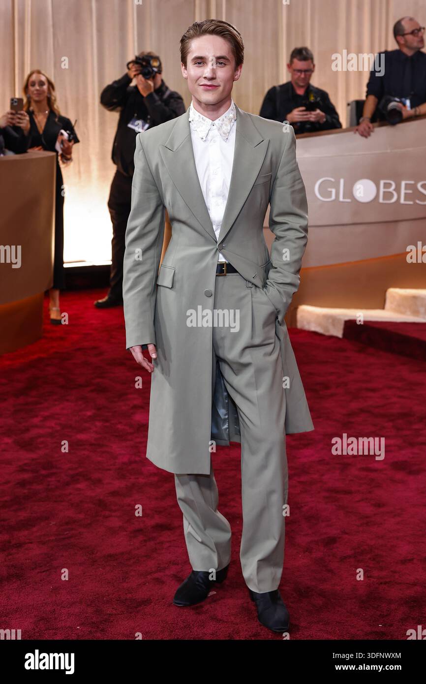 Ollie Muhl walking on the red carpet at The 83rd Annual Golden Globe ...
