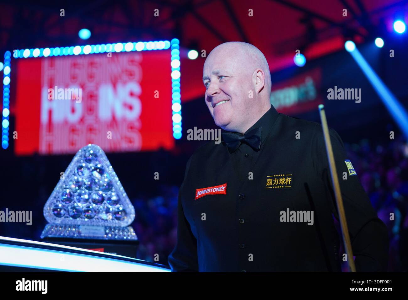John Higgins's walk on during the round one match between John Higgins ...