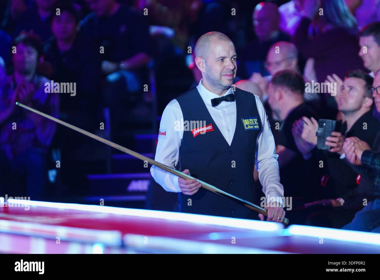 Barry Hawkins's walk on during the round one match between John Higgins ...