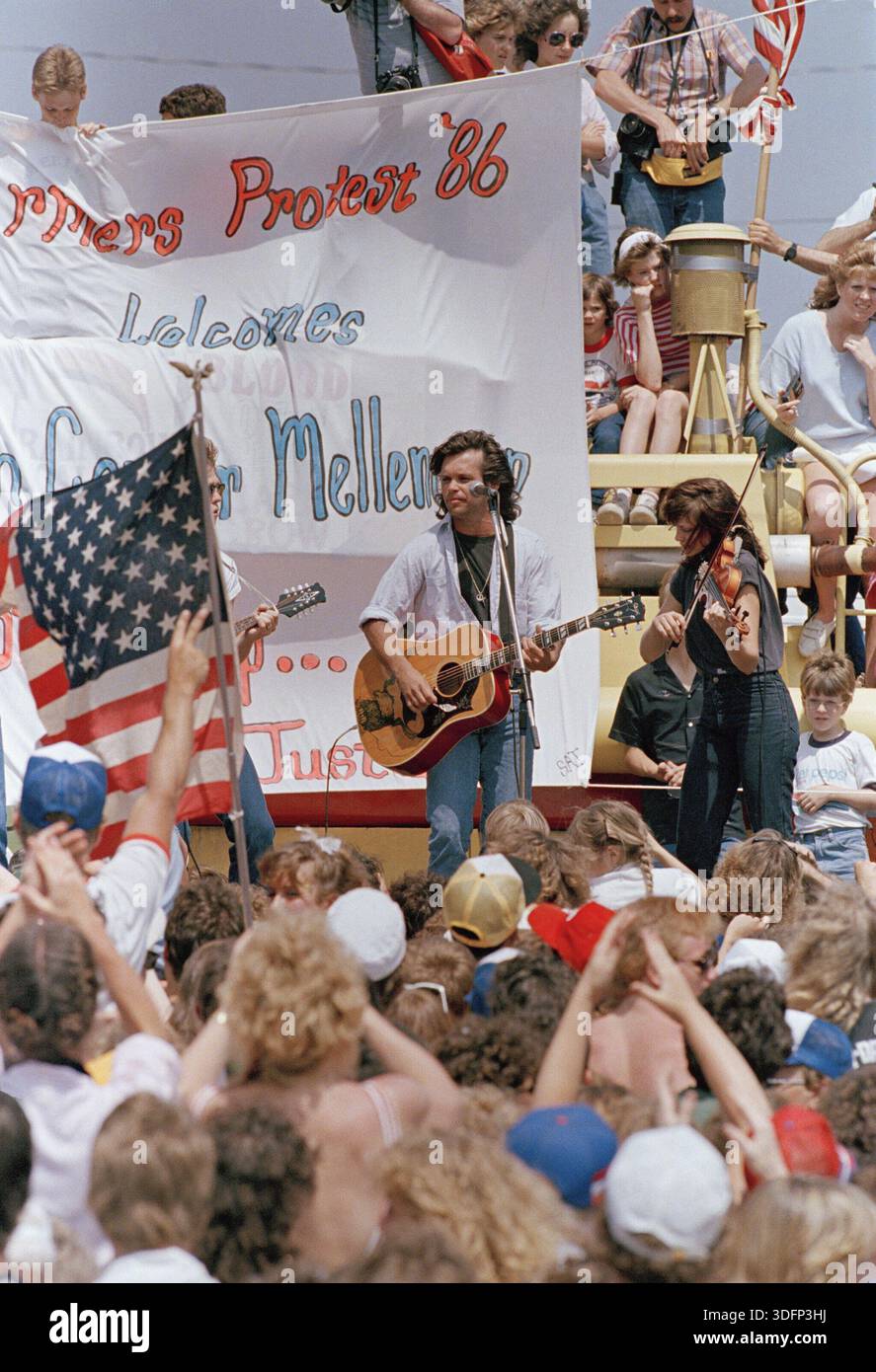 FILE - Singer John Cougar Mellencamp performs at a farmer's rally in ...