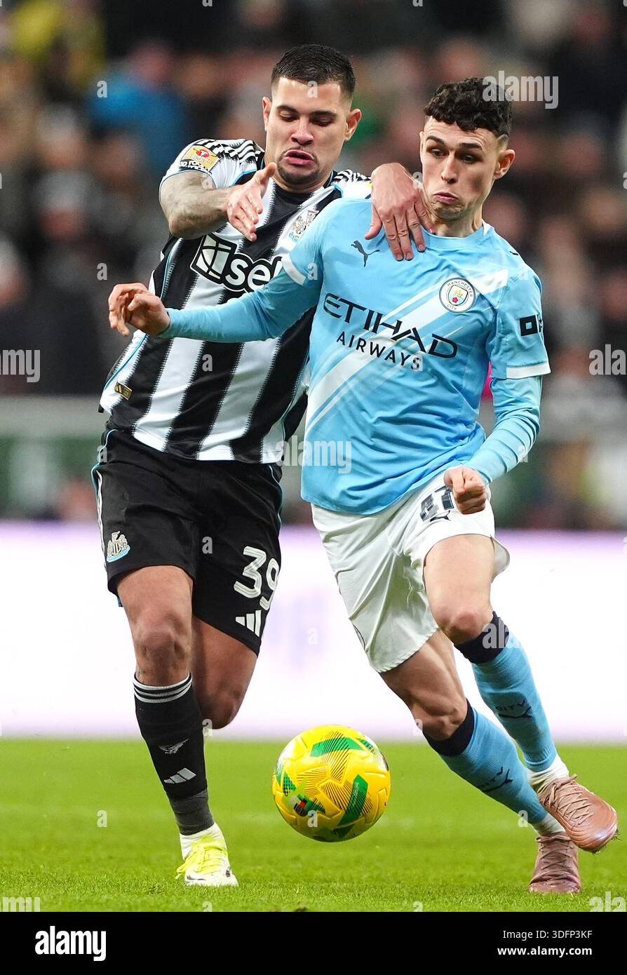 Newcastle United's Bruno Guimaraes (left) and Manchester City's Phil ...