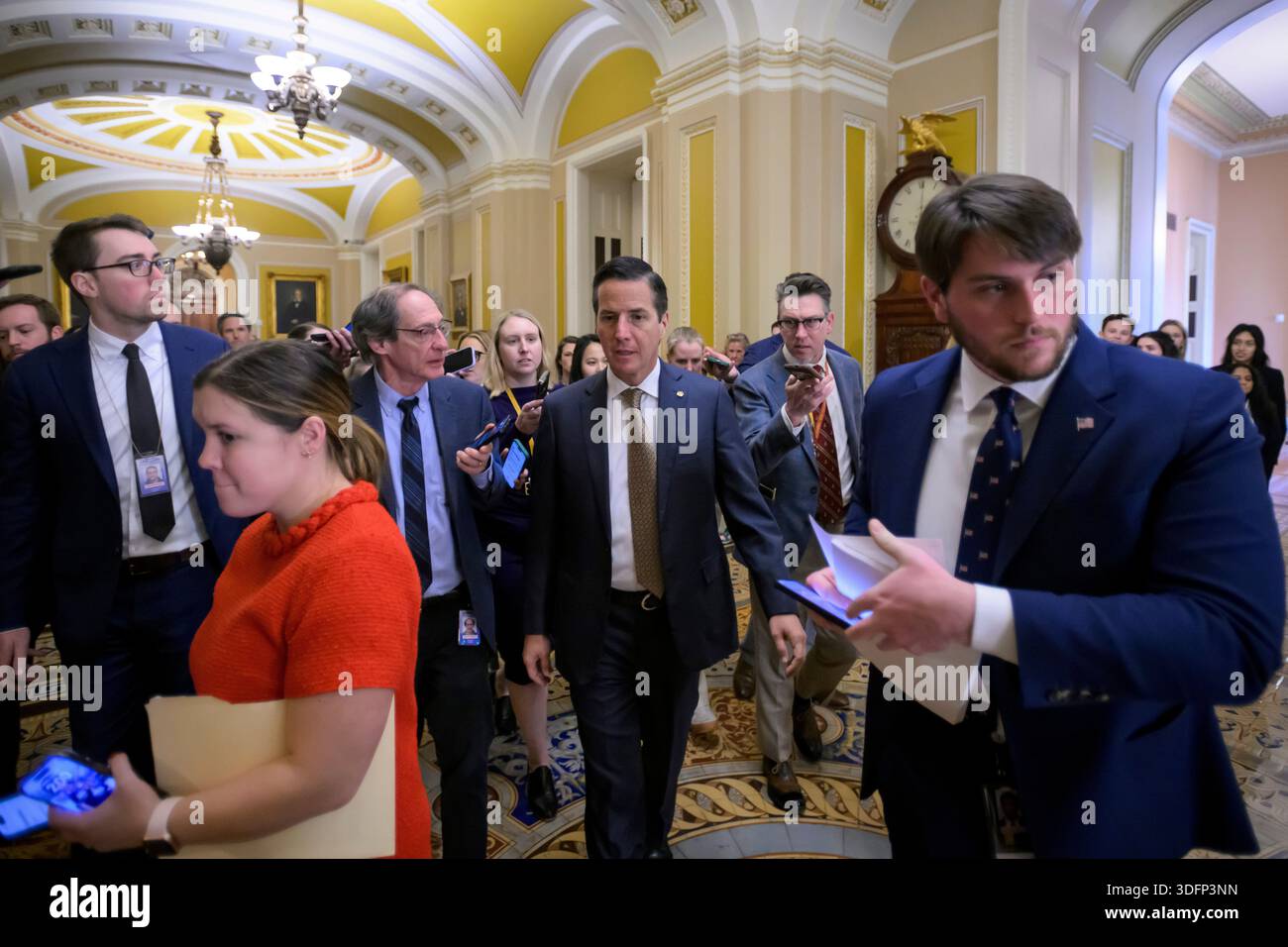 Sen. Bernie Moreno, R-Ohio, center, talks with reporters as he walks ...
