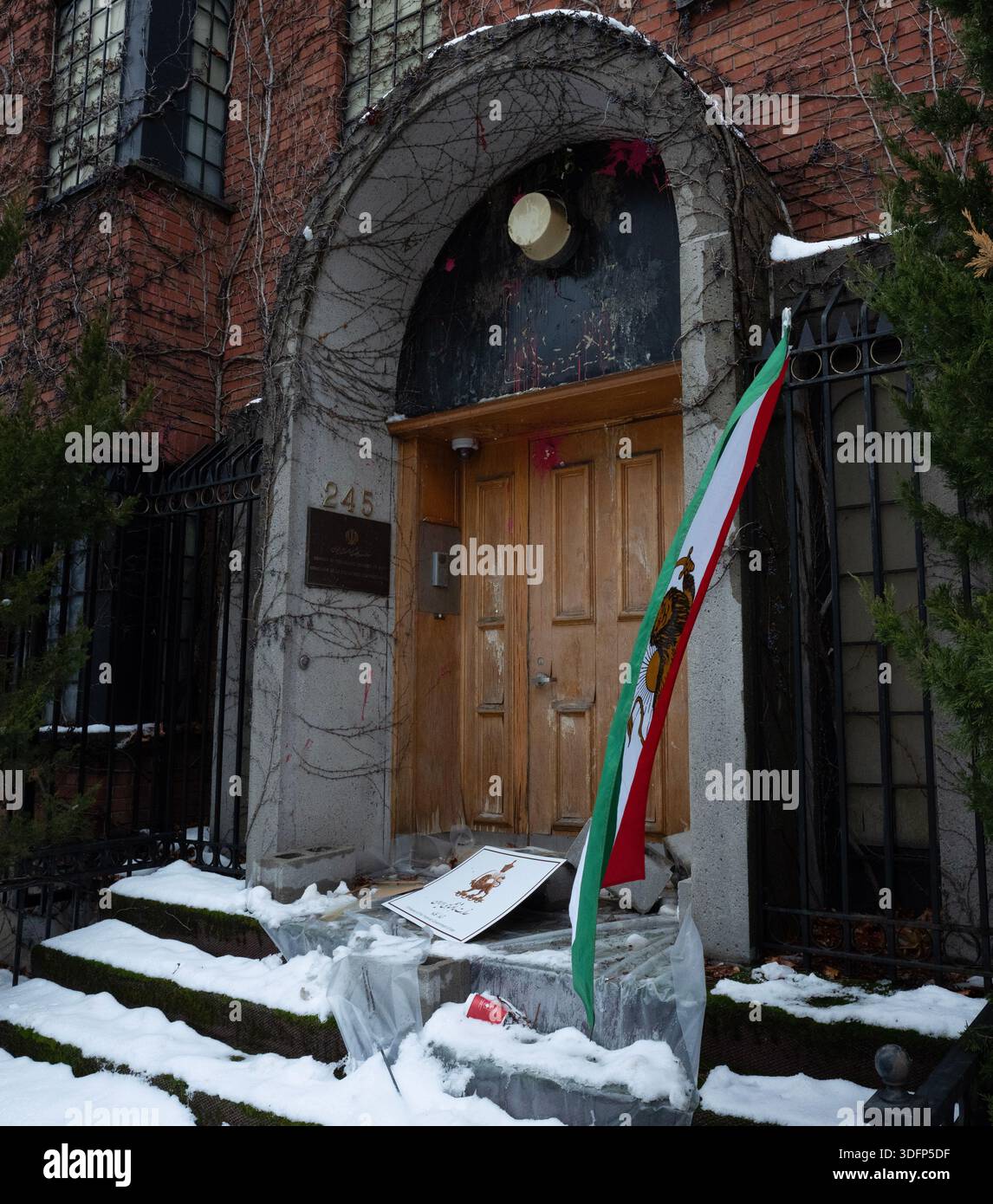 Ottawa, Canada. 13th Jan, 2026. The sign for the Iranian embassy is ...