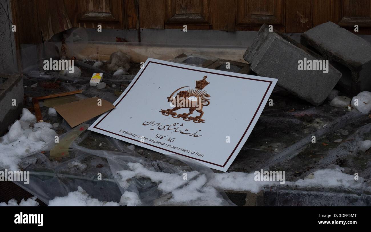 The sign for the Iranian embassy is seen on the ground outside the ...