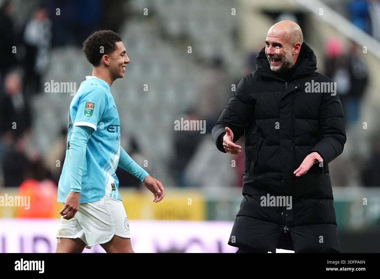Manchester City manager Pep Guardiola (right) celebrates with player ...