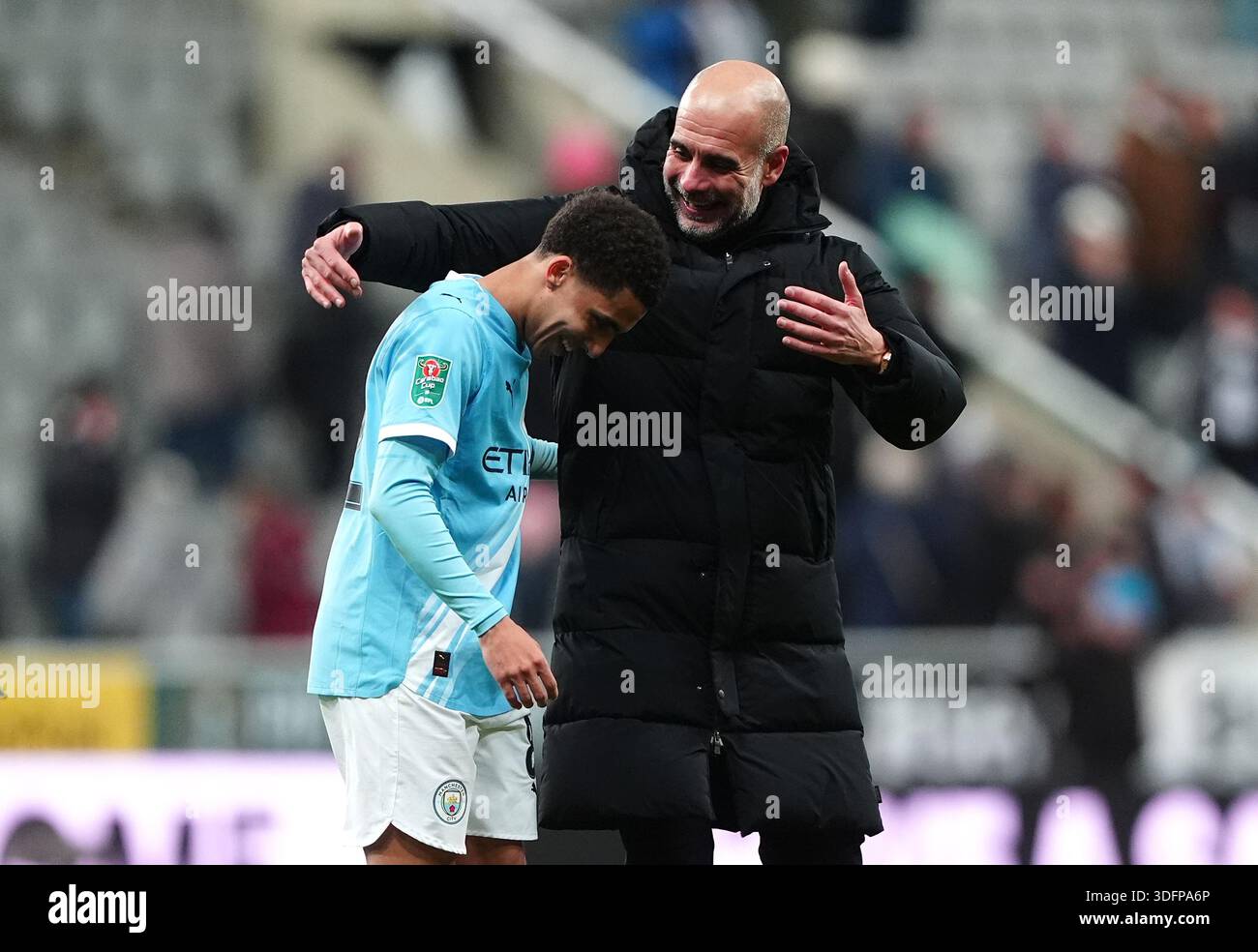Manchester City manager Pep Guardiola (right) celebrates with player ...
