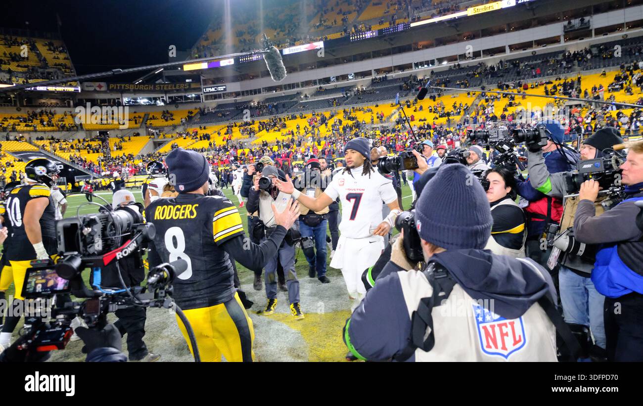 Jan 12, 2025: Aaron Rodgers #8 and C.J. Stroud #7 after the Pittsburgh ...