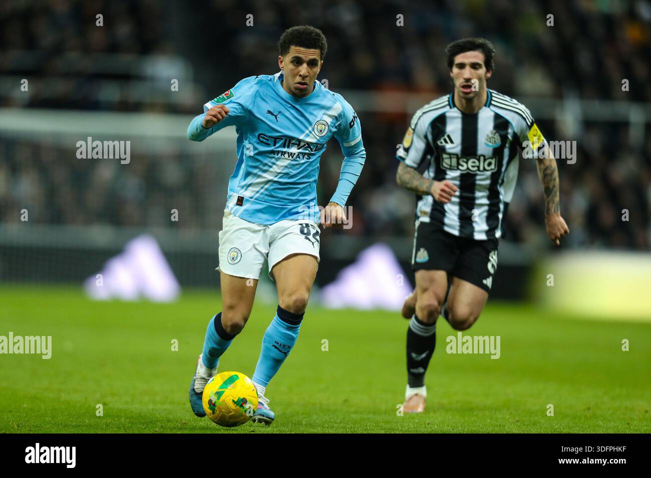 Rico Lewis Of Manchester City Brings the ball forward during the ...
