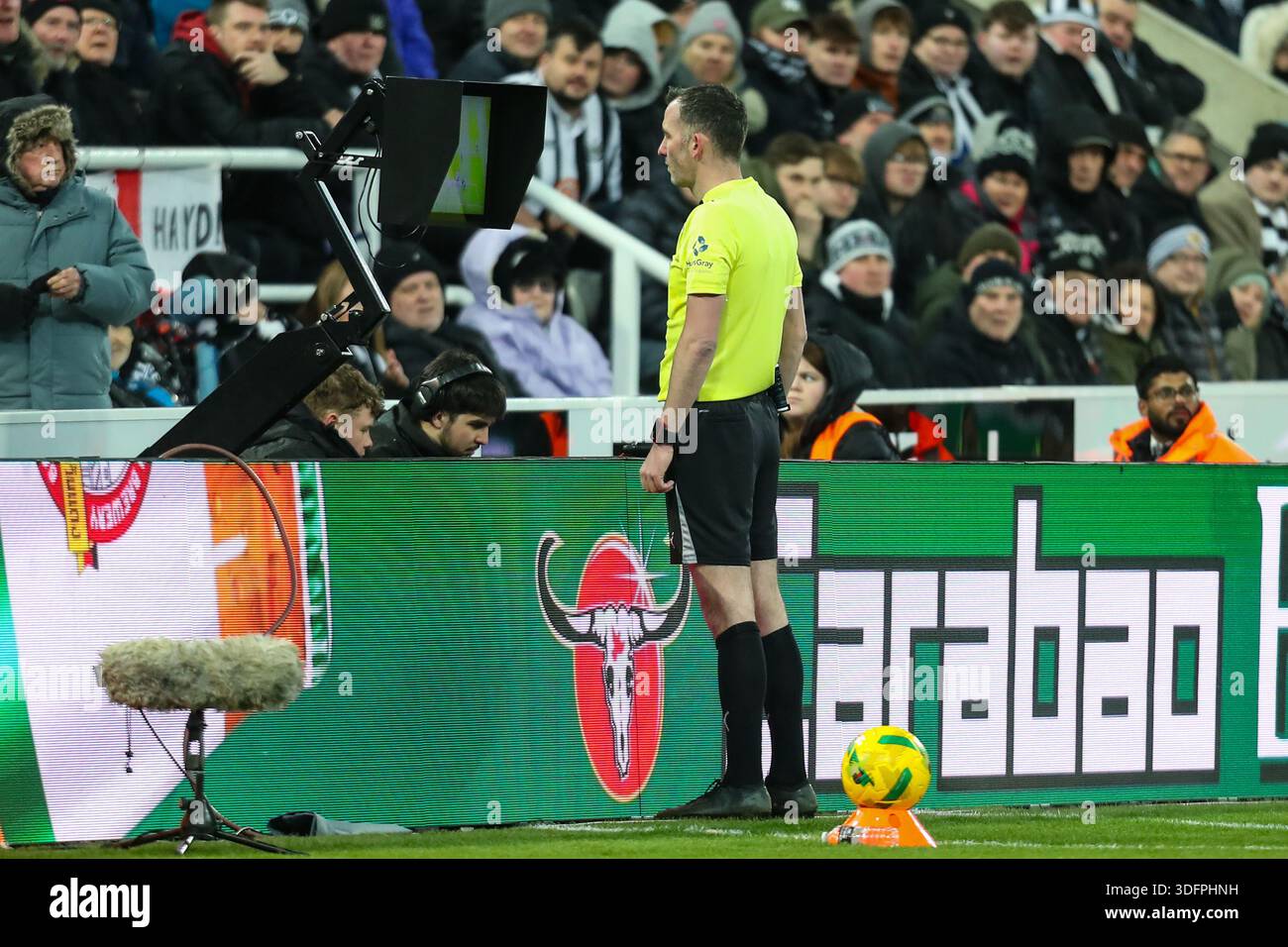 Referee Chris Kavanagh goes over to the VAR screen during the Newcastle ...