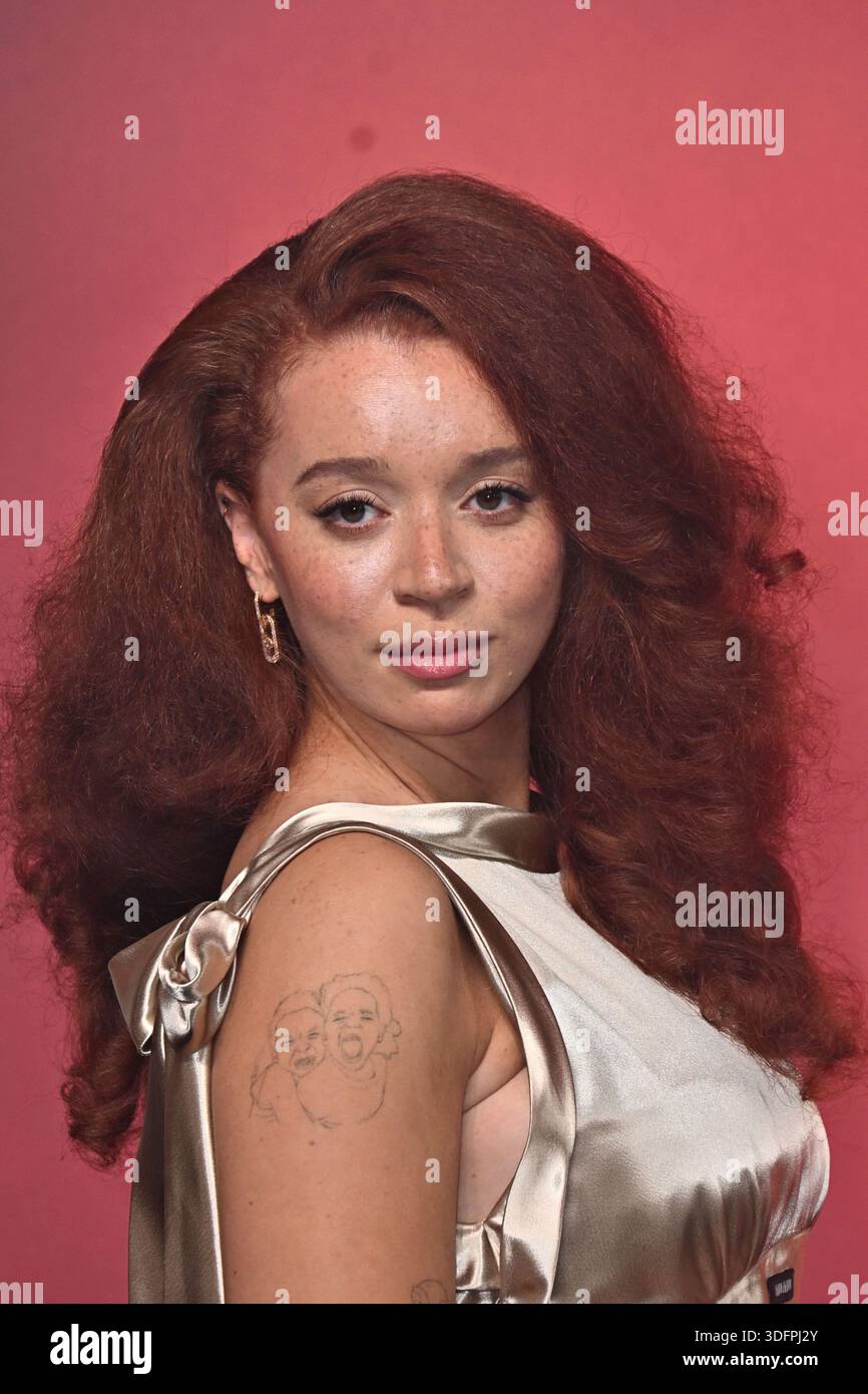 Erin Kellyman walks the red carpet. Chi Lewis-Parry walks the red ...