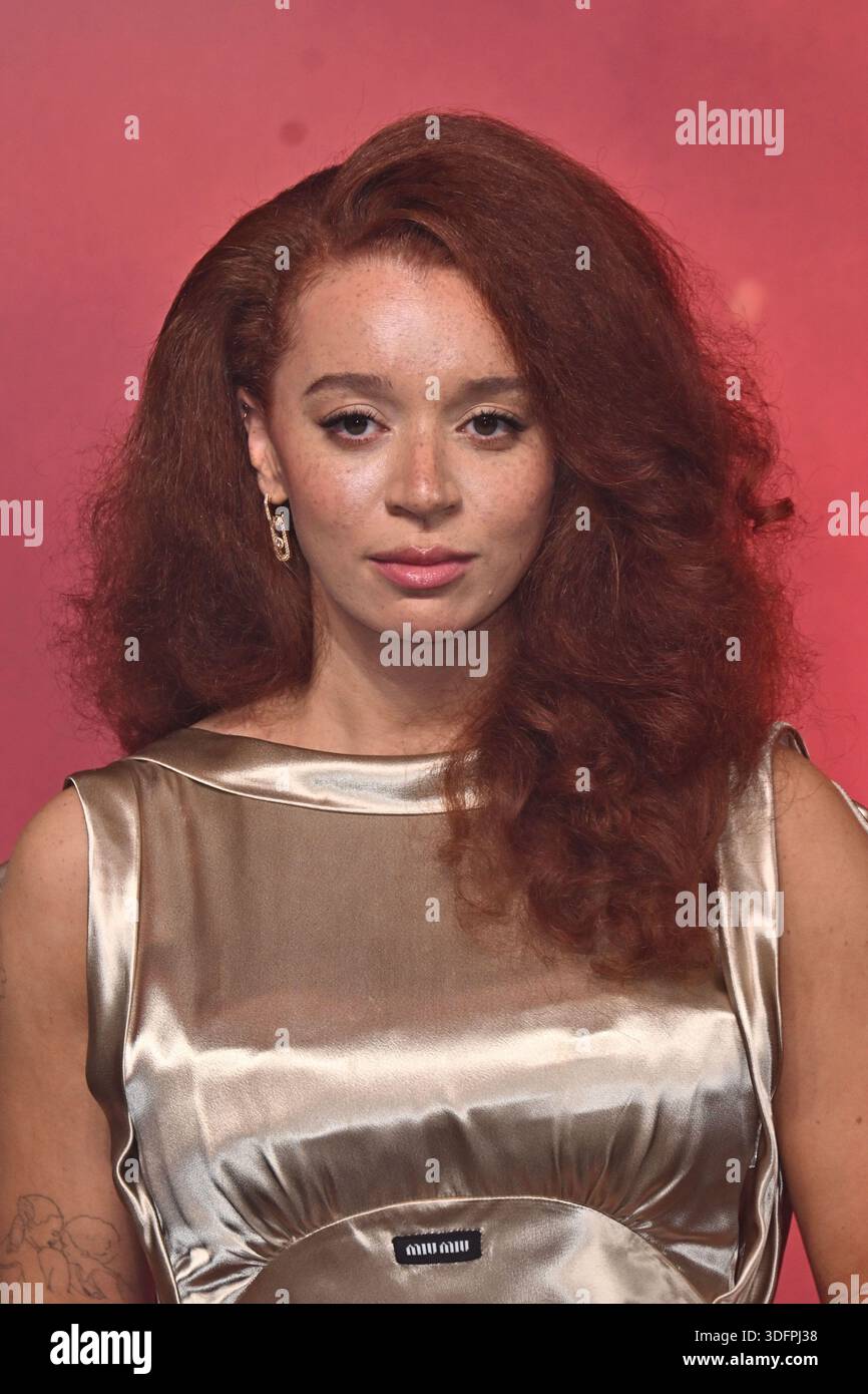 Erin Kellyman walks the red carpet. Chi Lewis-Parry walks the red ...