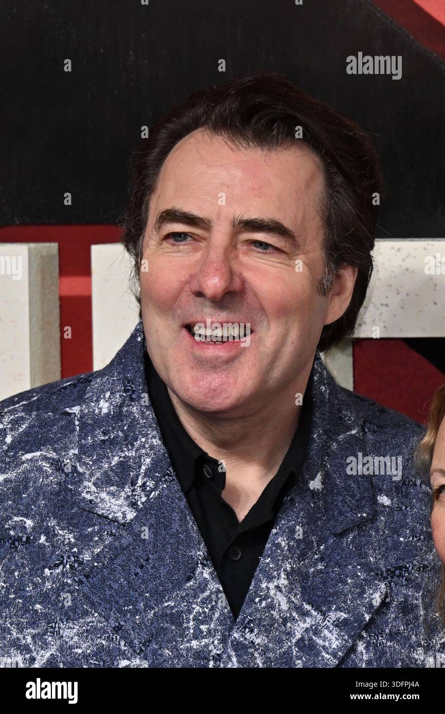 Jonathan Ross walks the red carpet. Chi Lewis-Parry walks the red ...