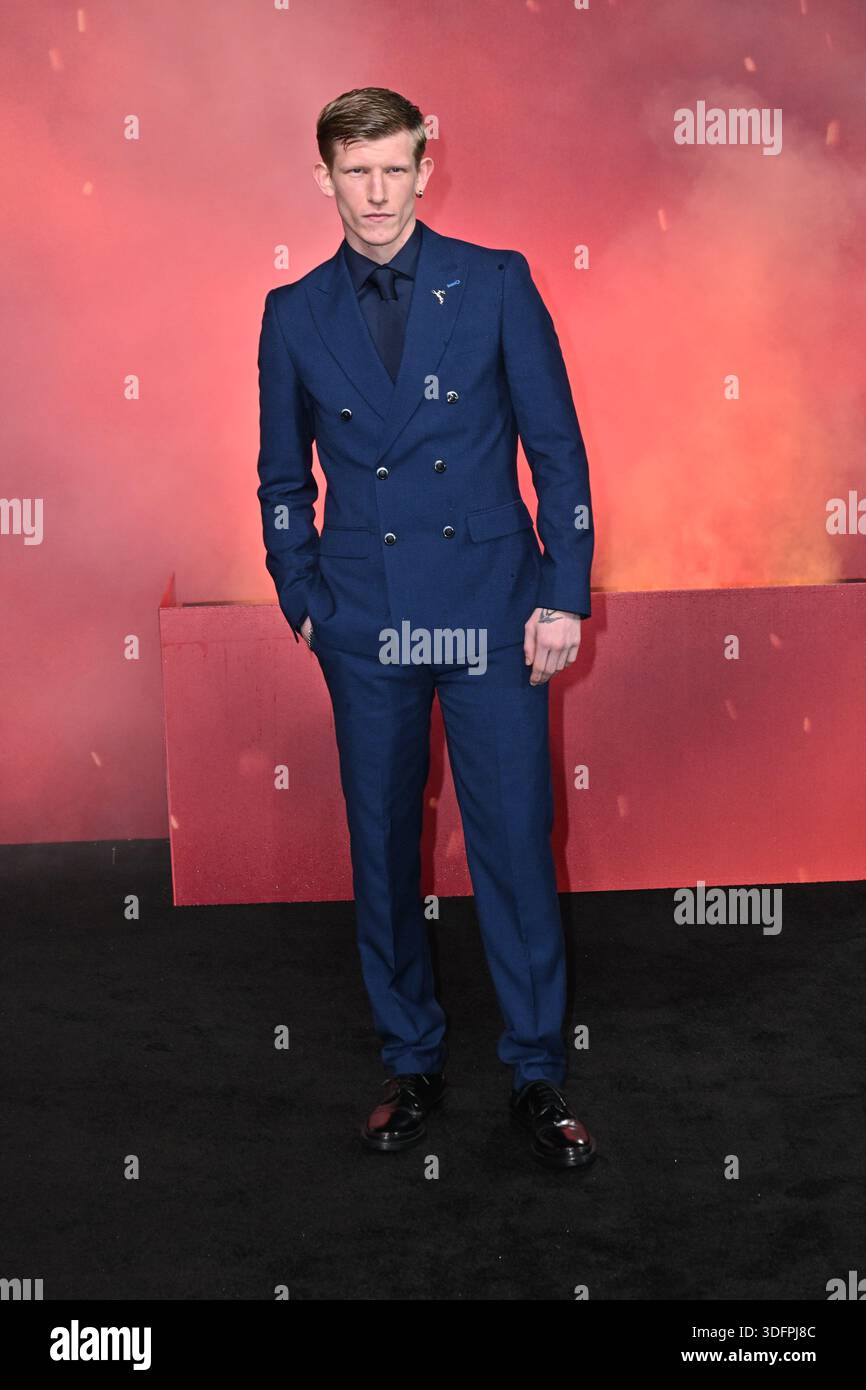 Connor Newall walks the red carpet. Chi Lewis-Parry walks the red ...