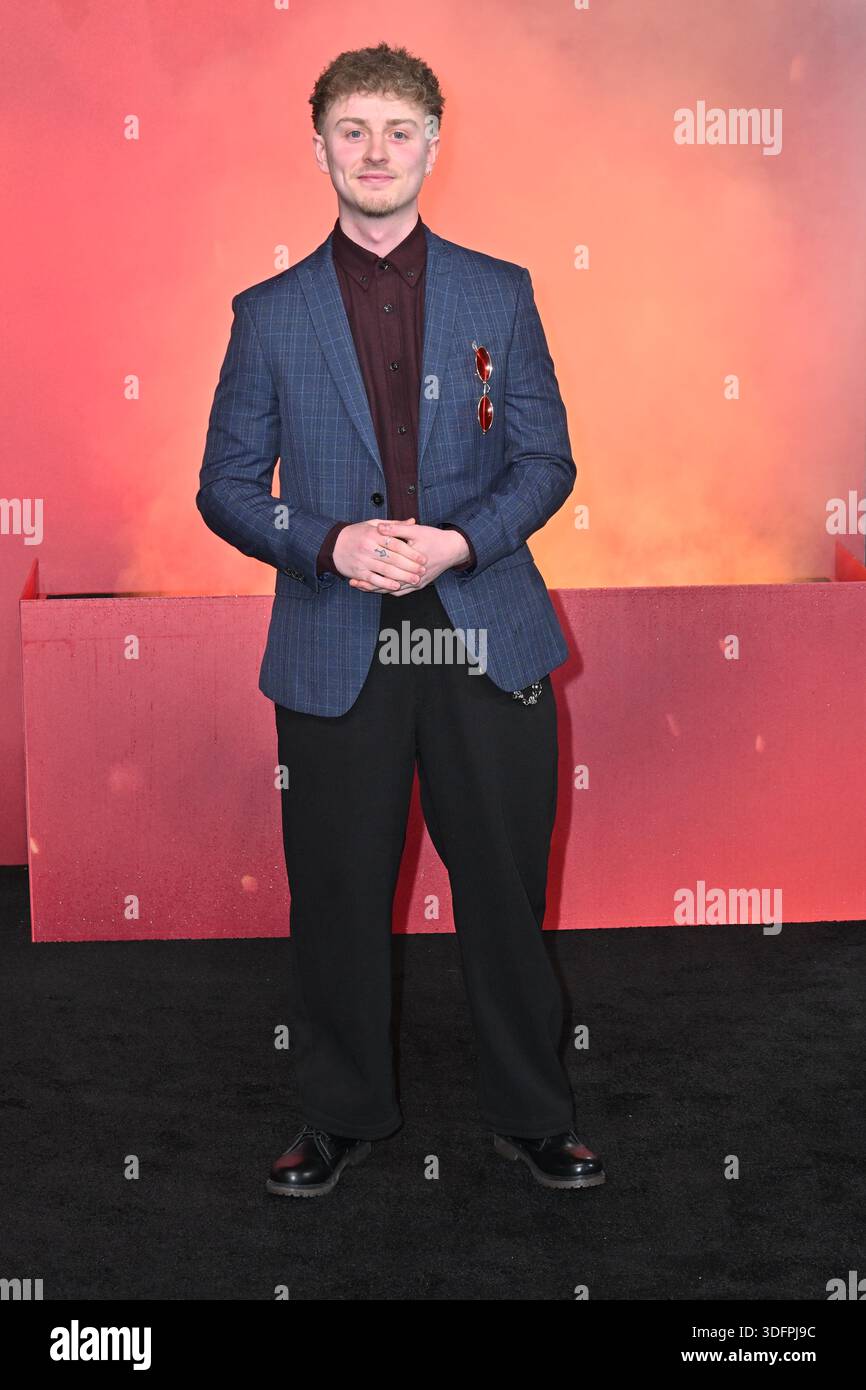 Sam Locke walks the red carpet. Chi Lewis-Parry walks the red carpet ...