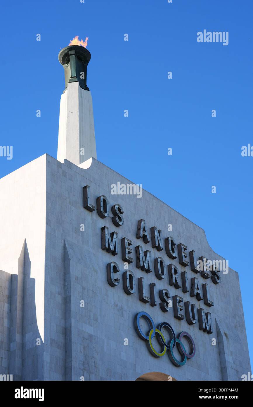 The Olympic cauldron is lit at the Los Angeles Memorial Coliseum ahead ...