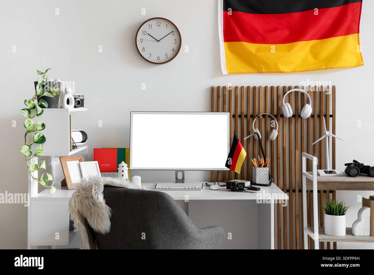 Interior of office with German flags and workplace Stock Photo - Alamy