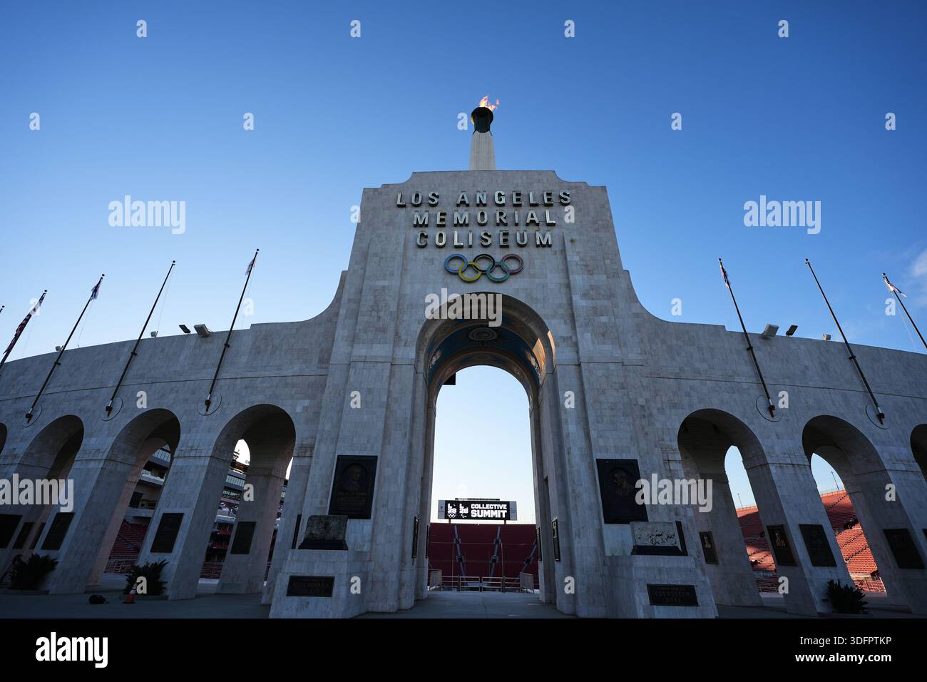 The Olympic cauldron is lit at the Los Angeles Memorial Coliseum ahead ...