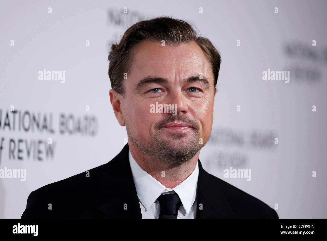 Leonardo DiCaprio arrives on the red carpet at the 2026 National Board ...