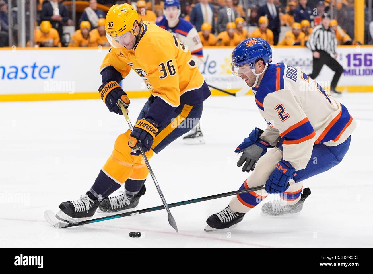 Nashville Predators left wing Cole Smith (36) skates the puck past ...