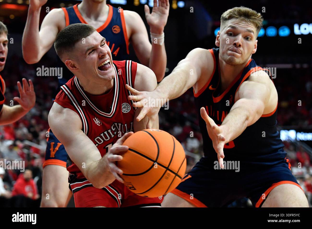 Virginia forward Thijs de Ridder, right, tries ot block a pass attempt ...