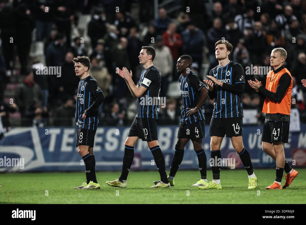 Club's players look dejected after a soccer game between Sporting ...