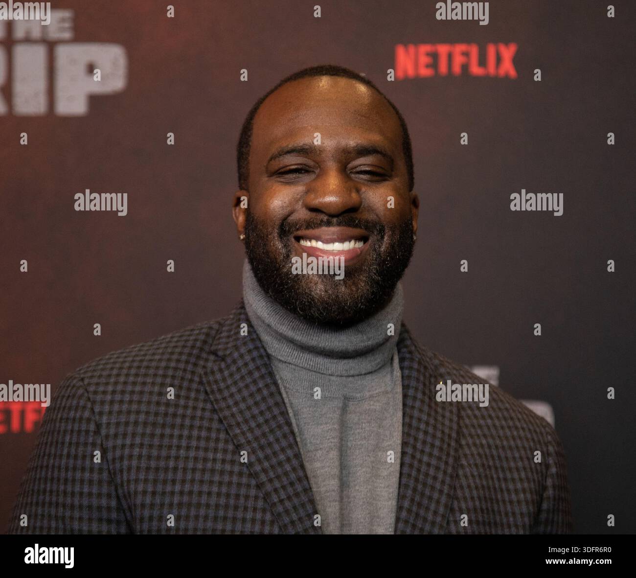 Kazeem Famuyide arrives on the red carpet for the Netflix's "The Rip ...